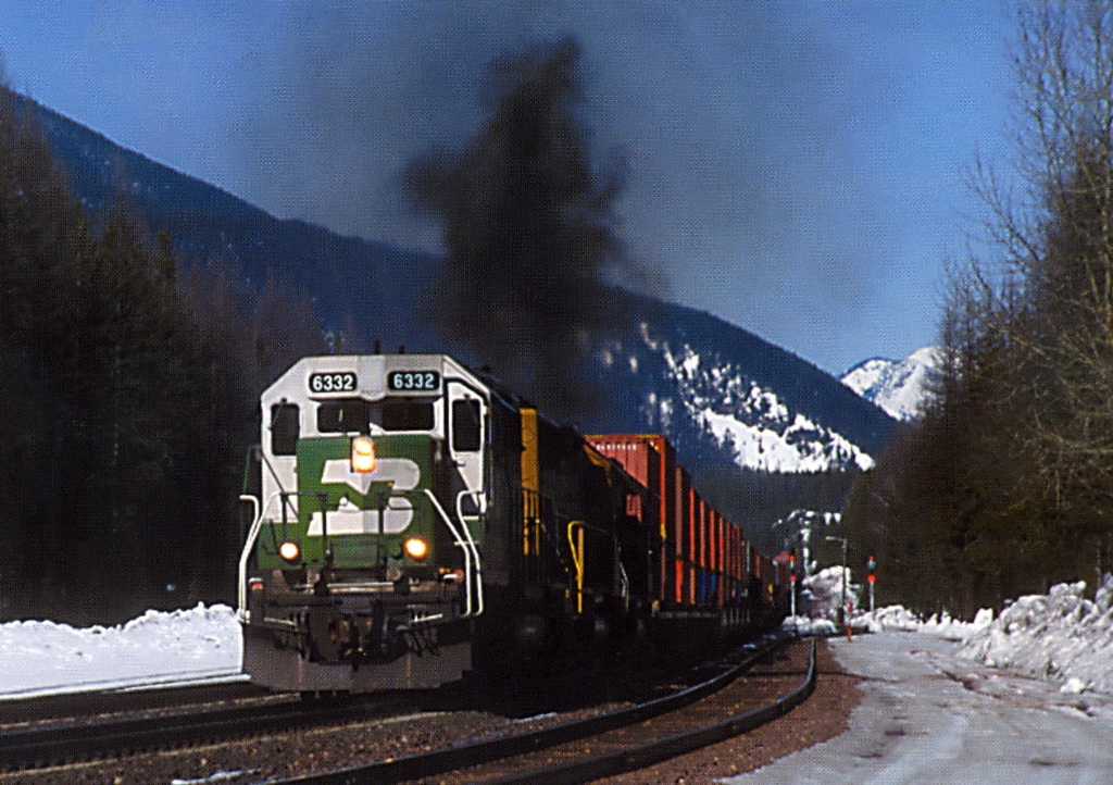 BN GM/EMD SD40-2 6332, an ATSF GM/EMD SD45-2 and a BNSF ex BN Patched GM/EMD GP40M with an ...